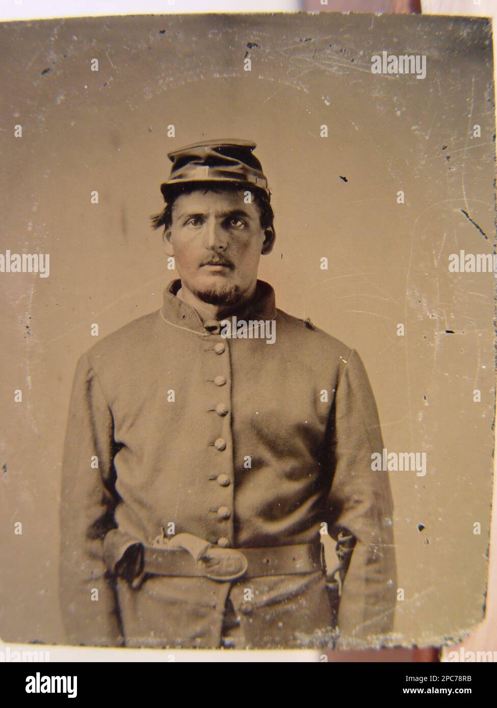 Unidentified soldier in Union sack coat and forage cap with revolver in ...