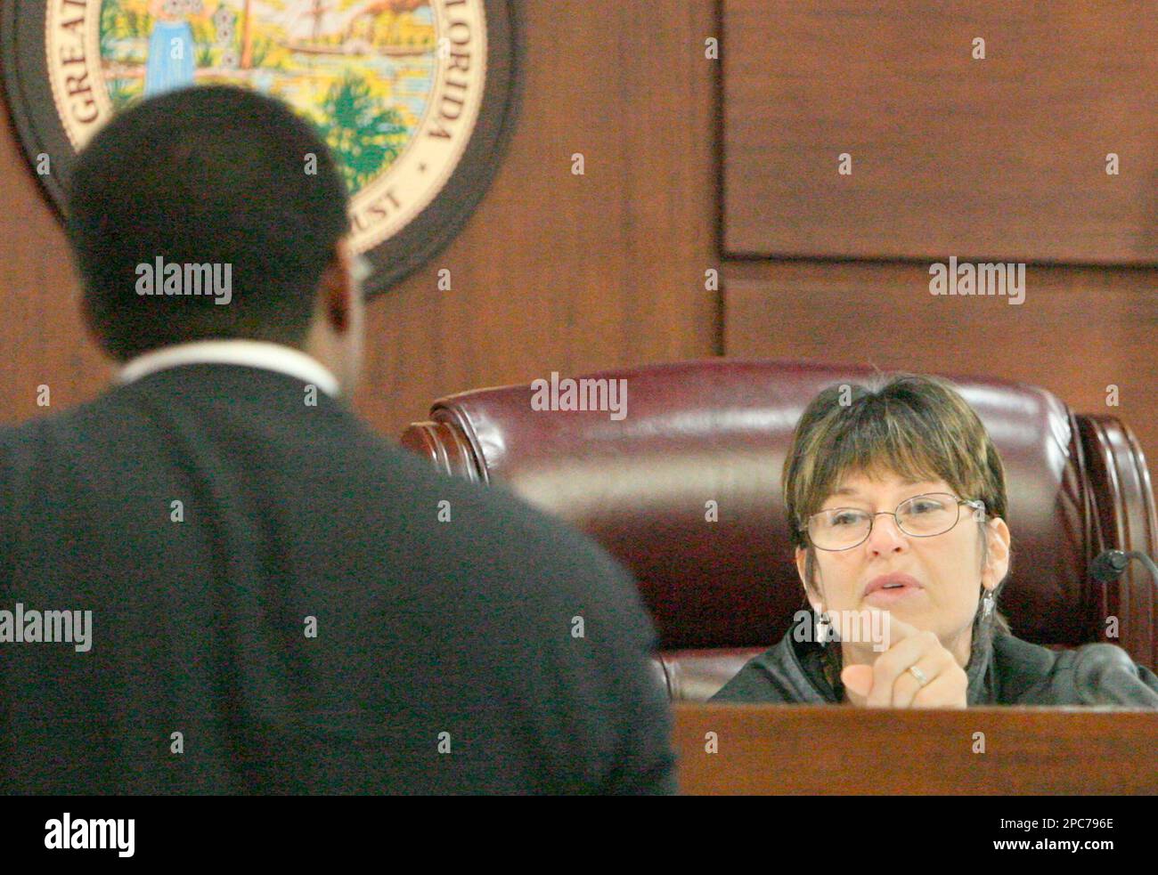 Judge Kathleen Dekker, right, discusses with defense attorney Richard ...