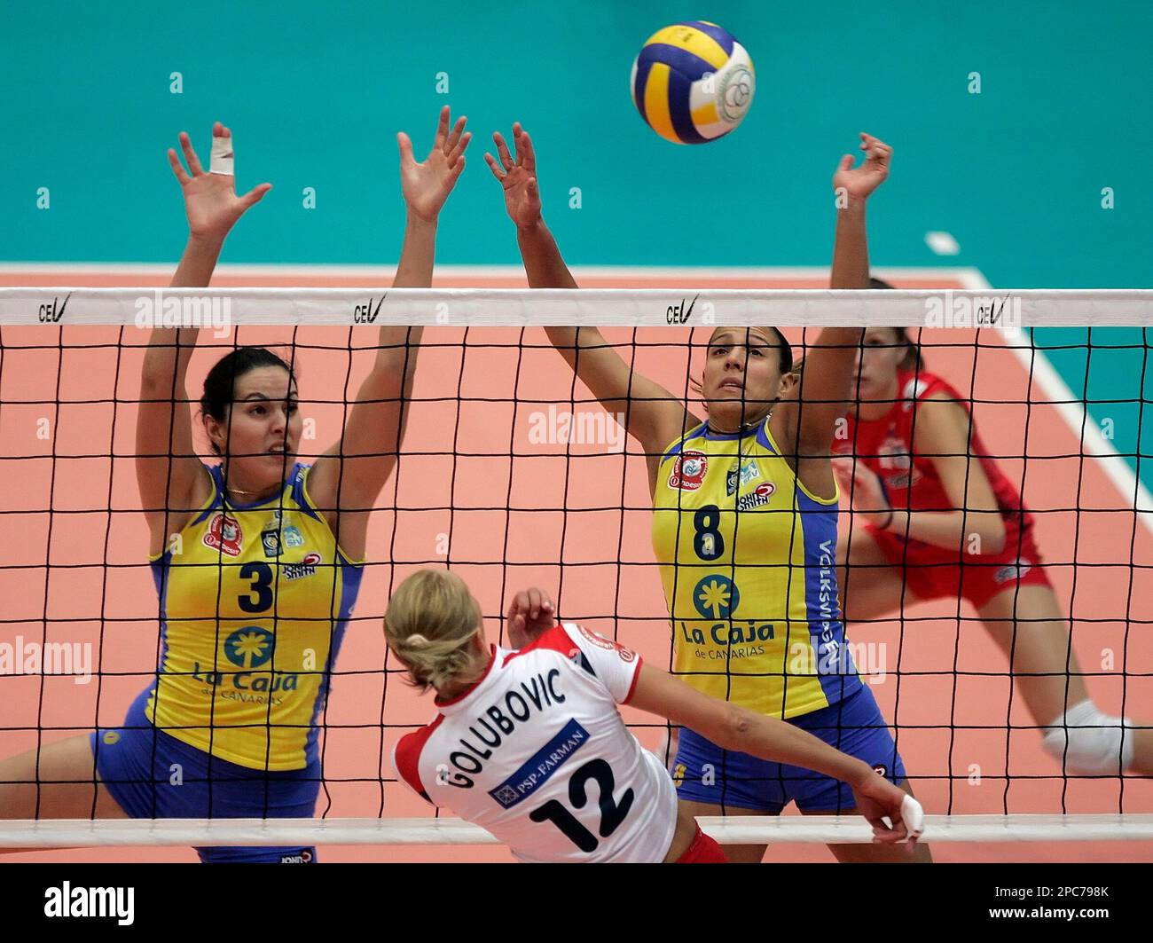 Zurich's Mira Golubovic, center, ducks while Spain's Isab Fernandez ...