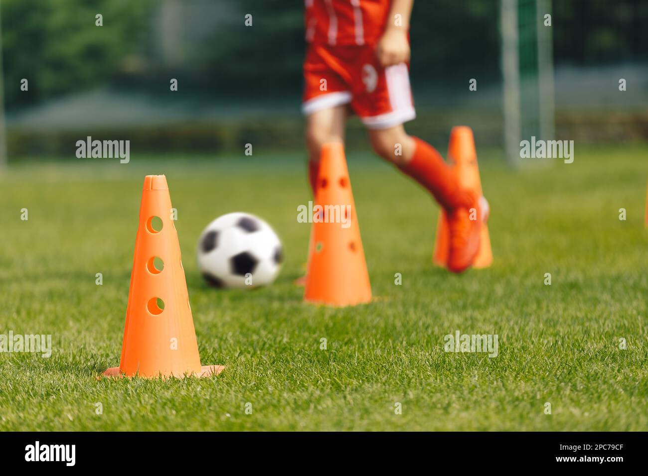 Football Training Background. Orange Practice Cone. Player Running Ball ...