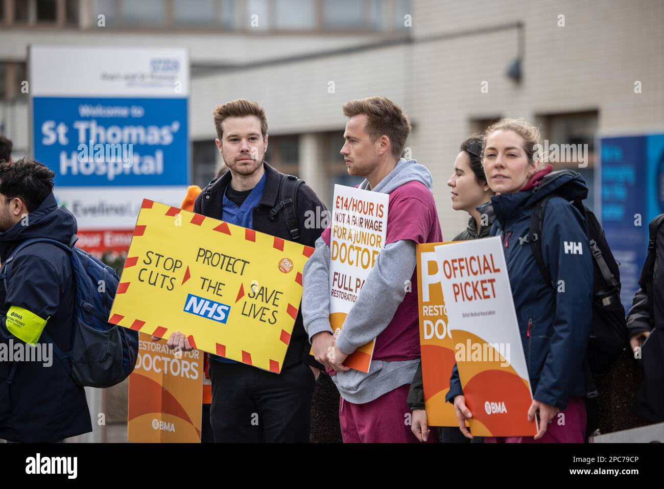 London, UK. 13th Mar, 2023. Junior doctors are seen holding placards at ...