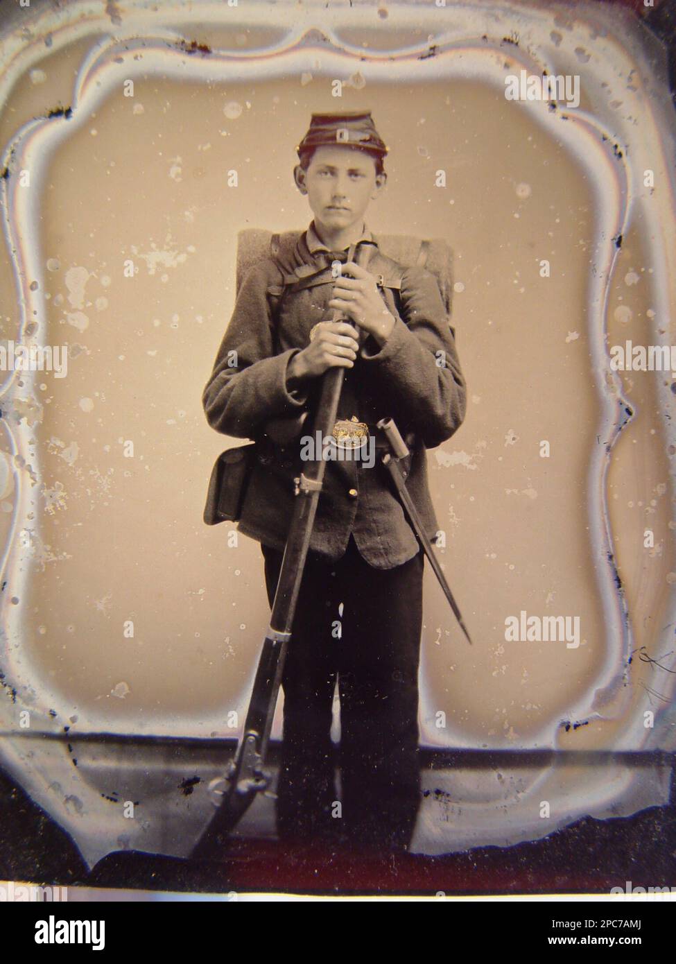 Unidentified young soldier in Union uniform with musket, bayonet, and ...