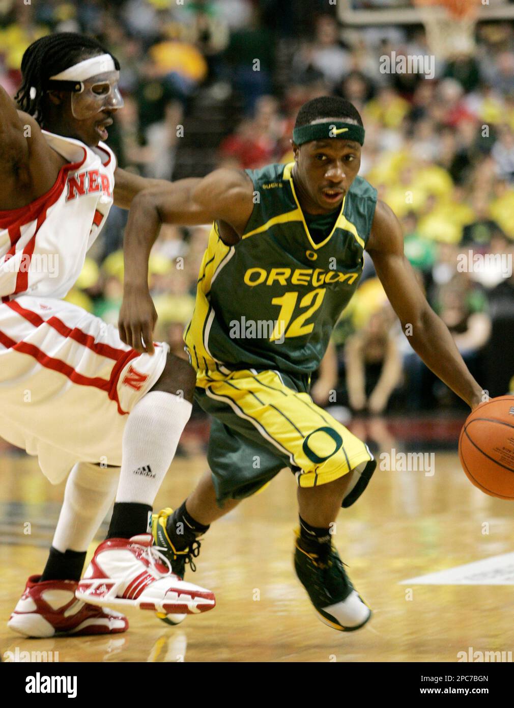 **FILE** Oregon guard Tajuan Porter, right, drives past Nebraska guard ...