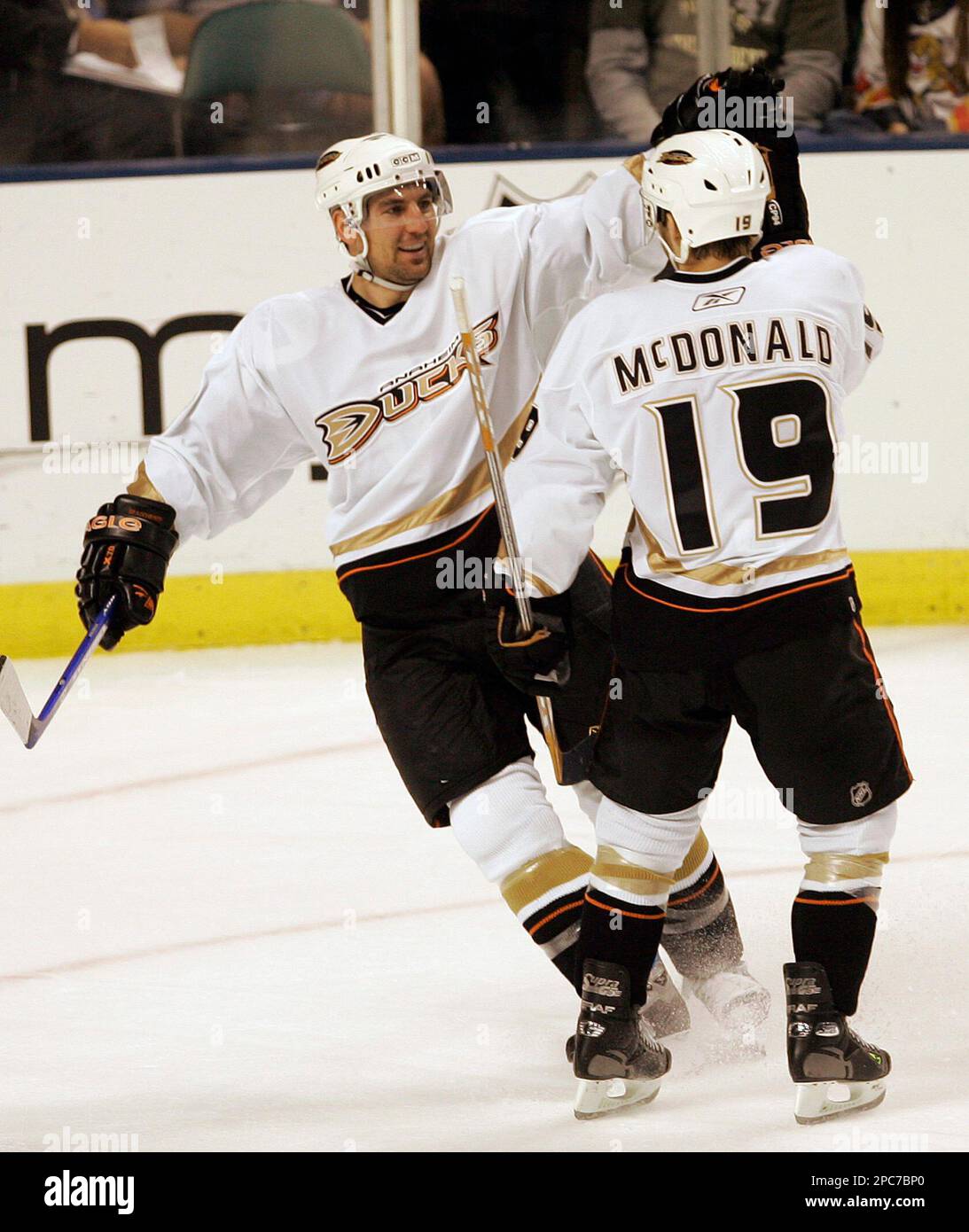 Anaheim Ducks' Francois Beauchemin, left, is congratulated by teammate ...