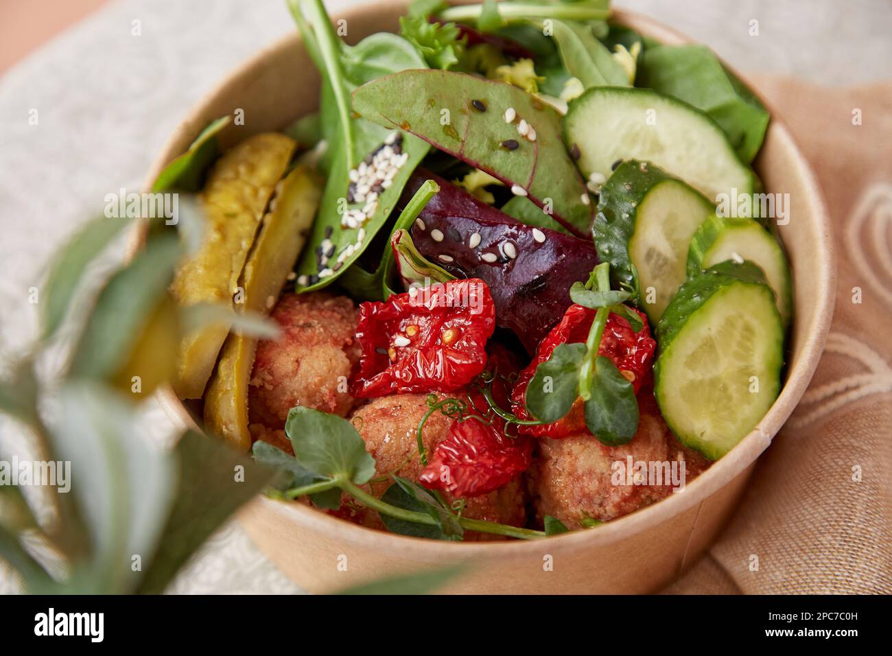 Healthy superfood bowl with vegetables, salad, hummus meatballs, pea ...
