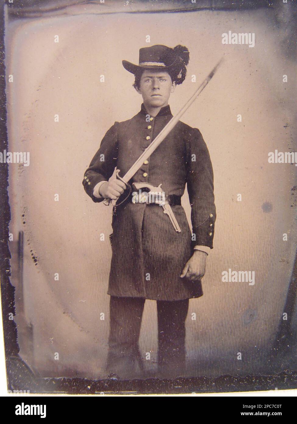 Unidentified young soldier in Confederate uniform and Hardee hat with ...