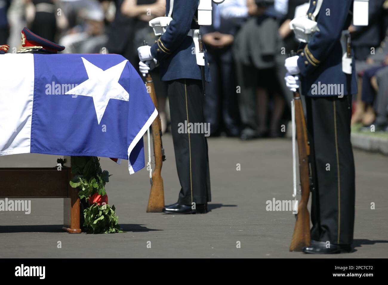 Honor guard soldiers stand near the coffin of former military ruler Gen ...
