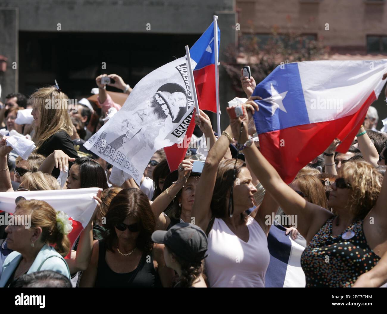 Supporters and relatives of former dictator Gen. Augusto Pinochet wave ...
