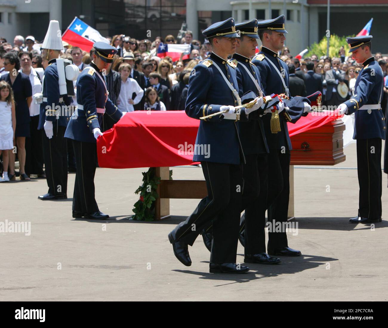 Chile's infantry soldiers take off the uniform and flag that covered ...