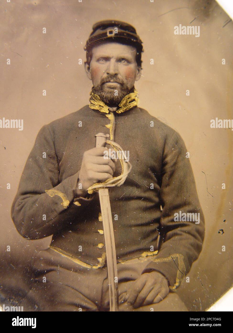 Unidentified soldier in Union cavalry uniform holding cavalry saber ...