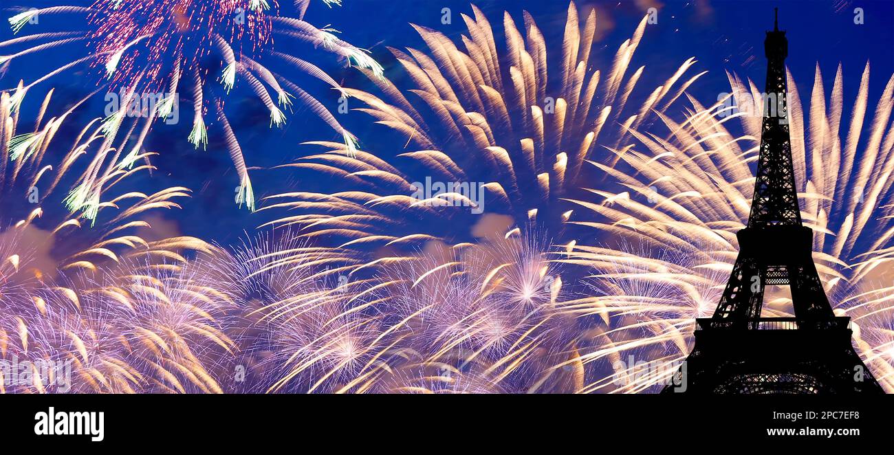 Celebratory colorful fireworks over the Eiffel Tower in Paris, France ...
