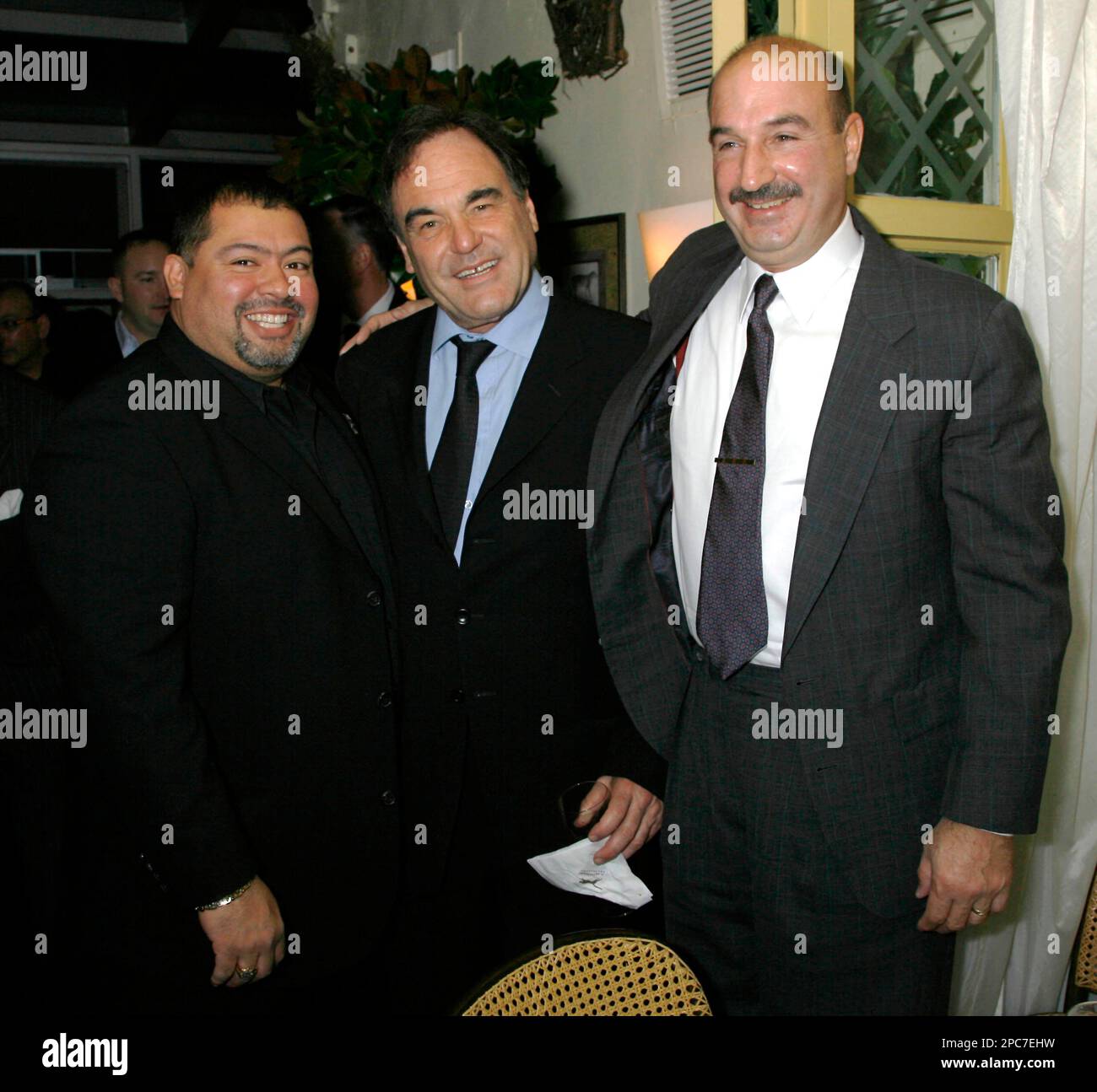 Port Authority policeman William Jimenez, left, film director Oliver ...