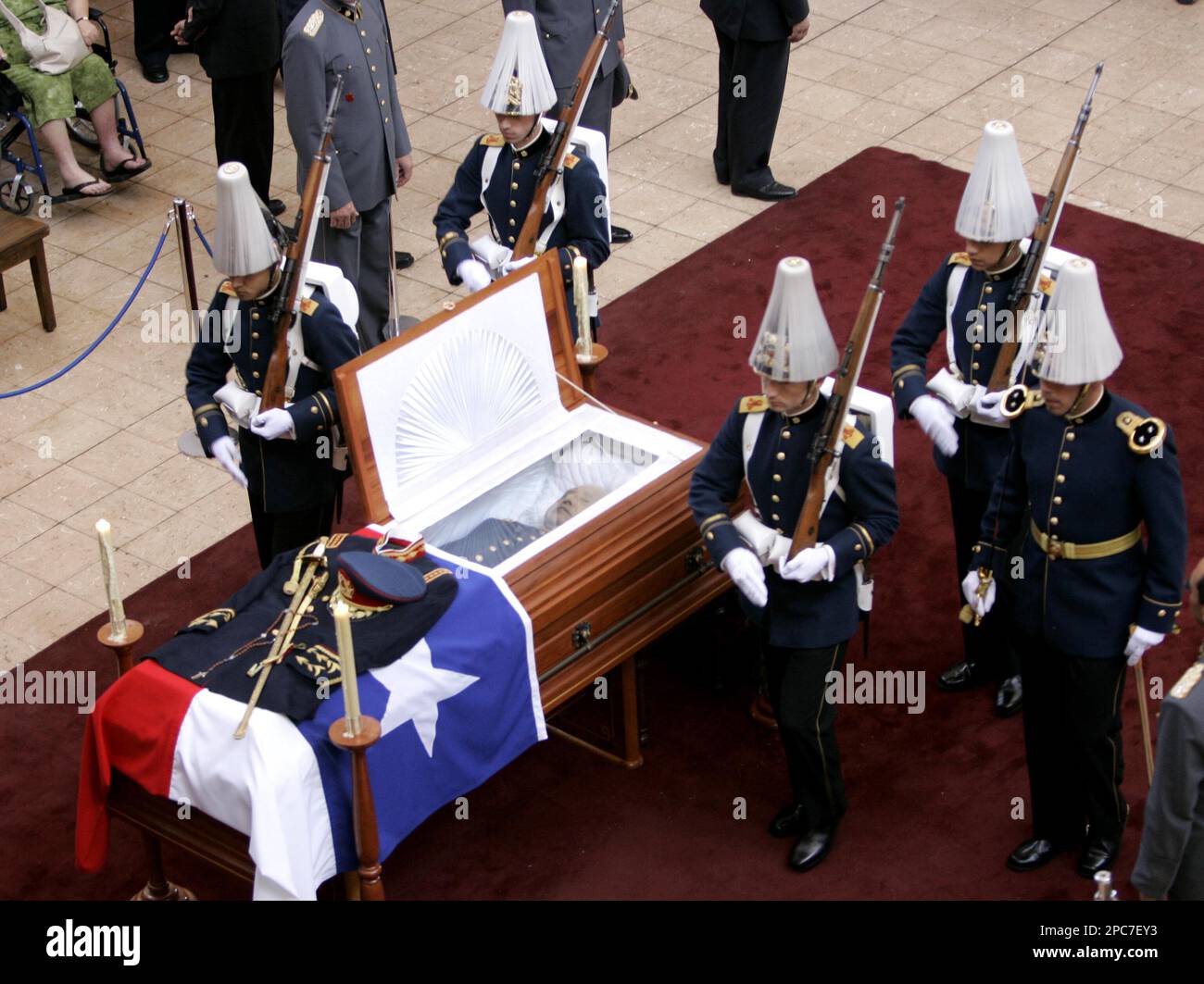 Soldiers exchange the honor guard for former military ruler Gen ...