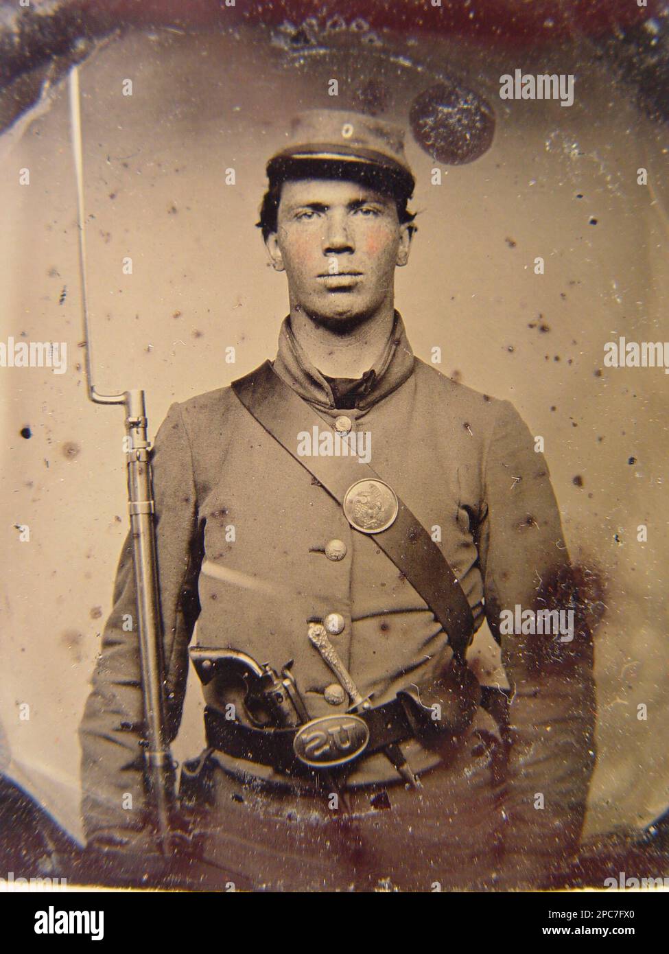 Unidentified soldier in Union uniform and Company C hat with bayoneted ...