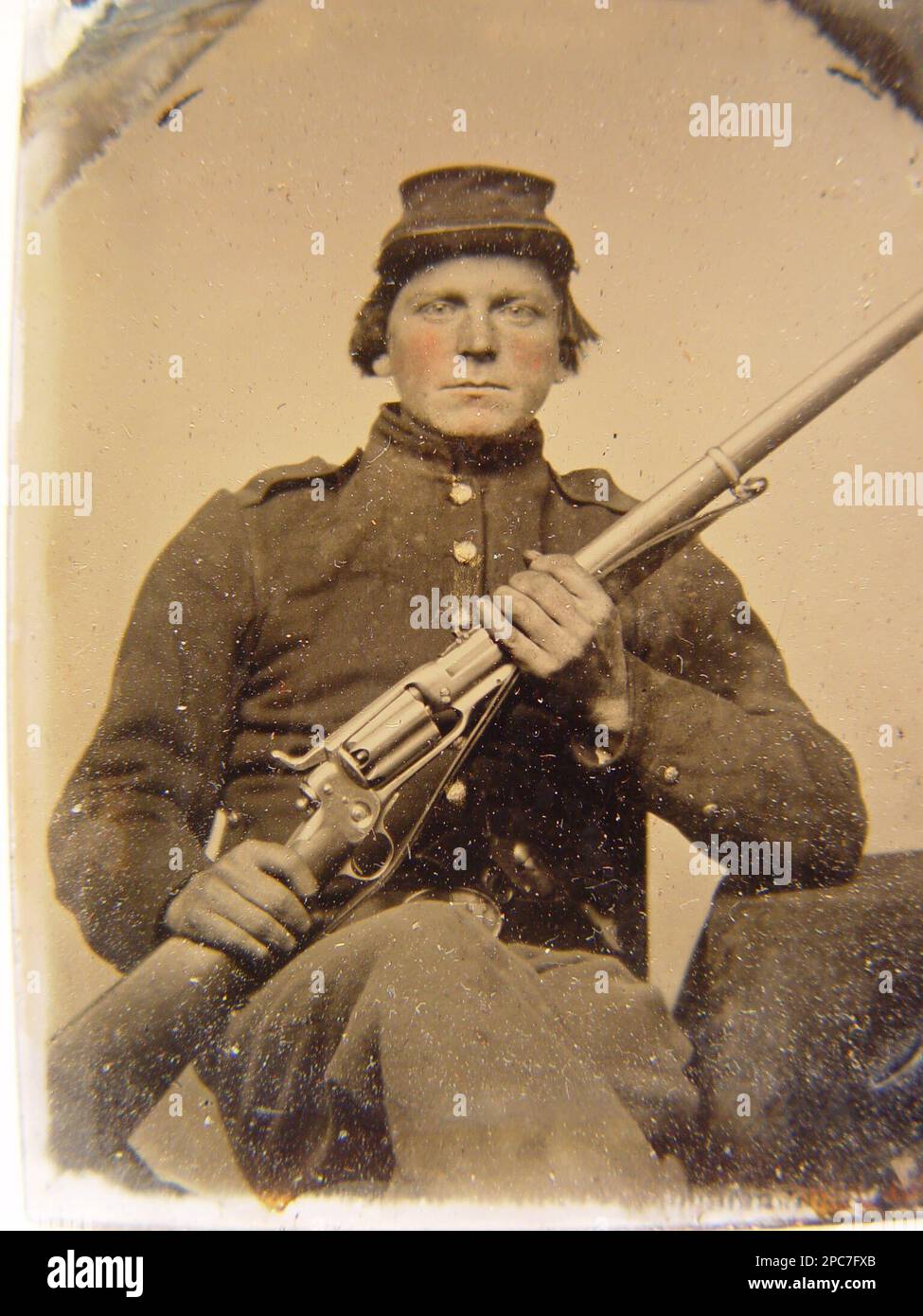 Unidentified soldier in Union uniform with Colt Revolving Rifle Model ...