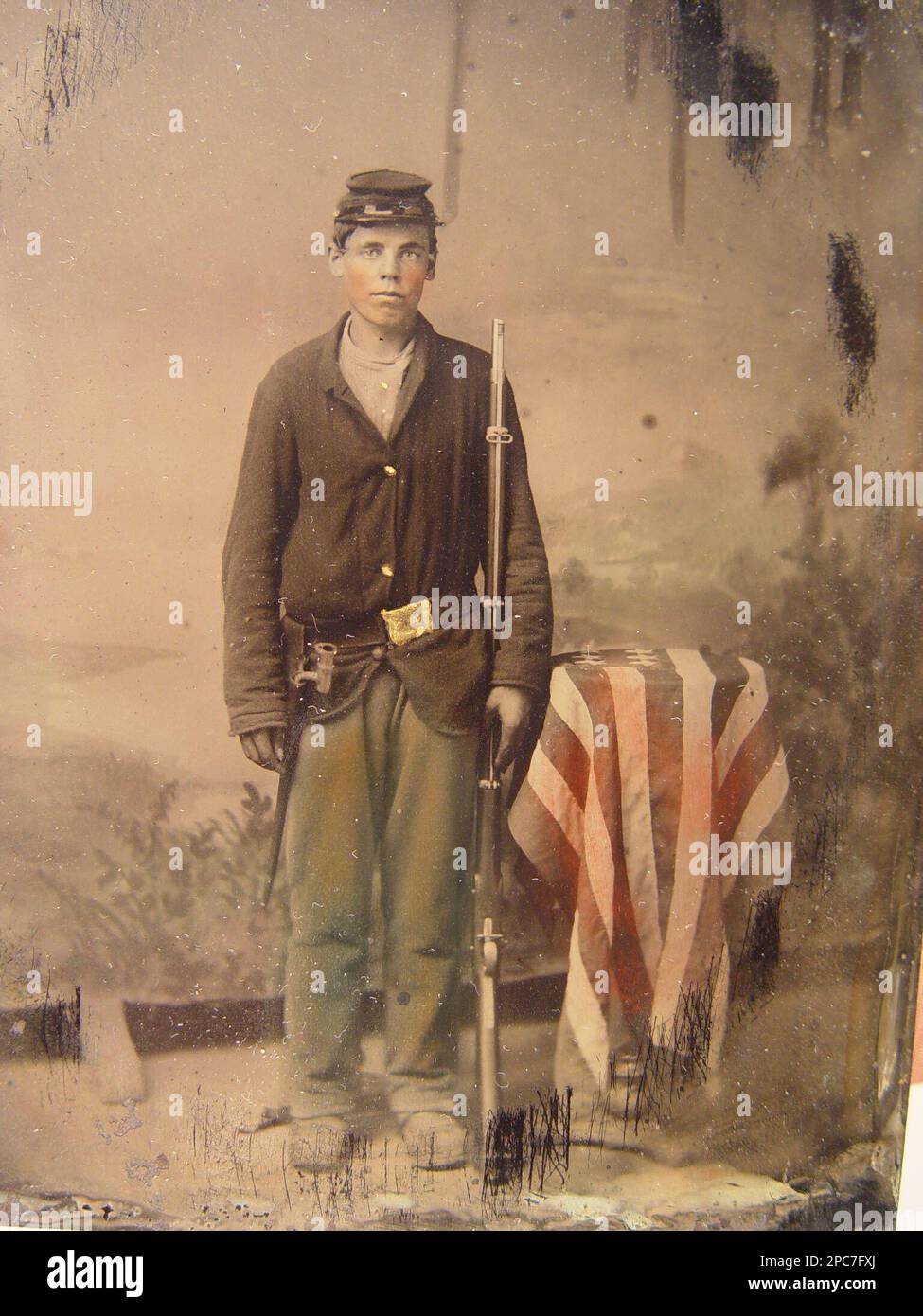 Unidentified young soldier in Union sack coat and forage cap with ...