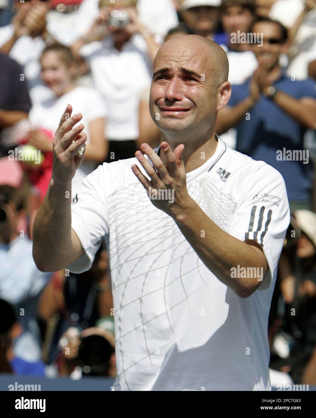 ** FOR USE WITH YEAR END--FILE **Andre Agassi acknowledges the crowd ...
