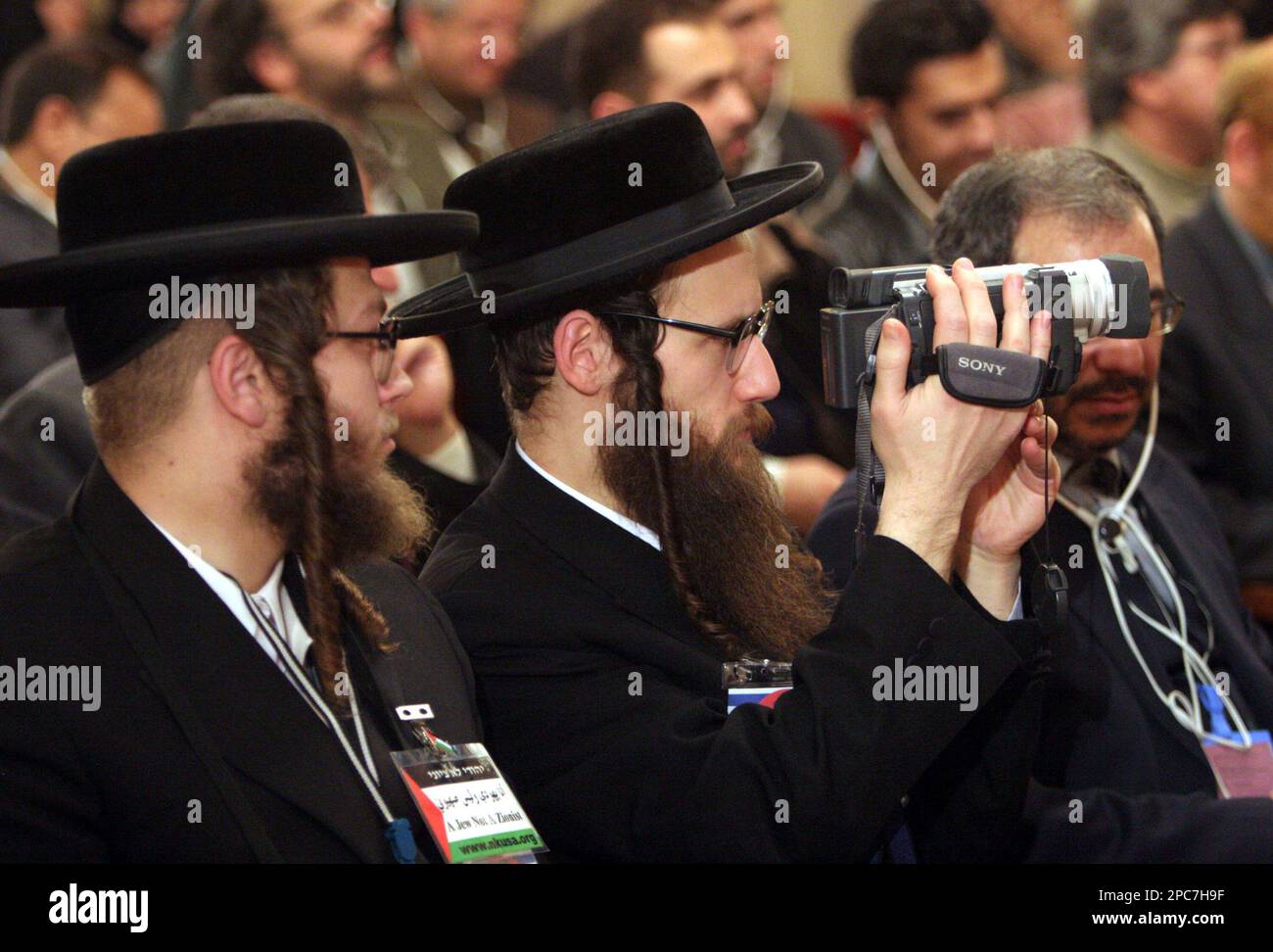 Rabbi Dovid Feldman, from the United States, films, as he attends a ...