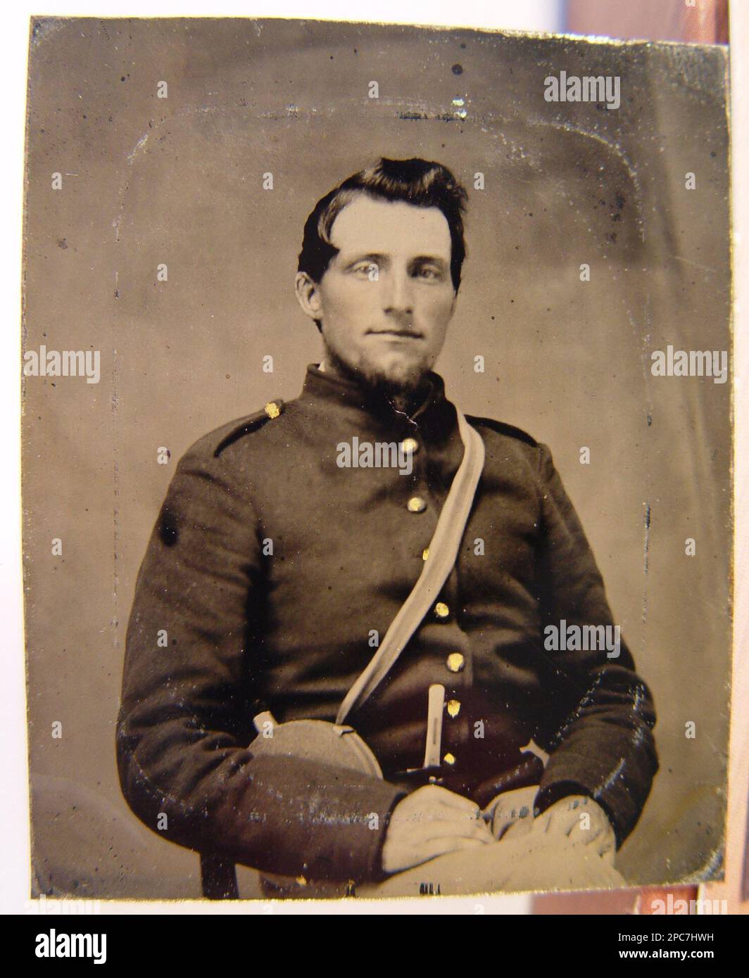 Unidentified soldier in Confederate uniform with canteen and knife ...