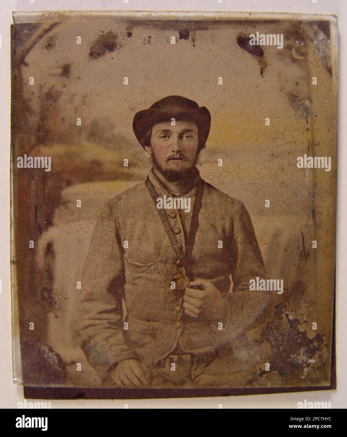 Unidentified soldier in Confederate shell jacket and slouch hat with ...