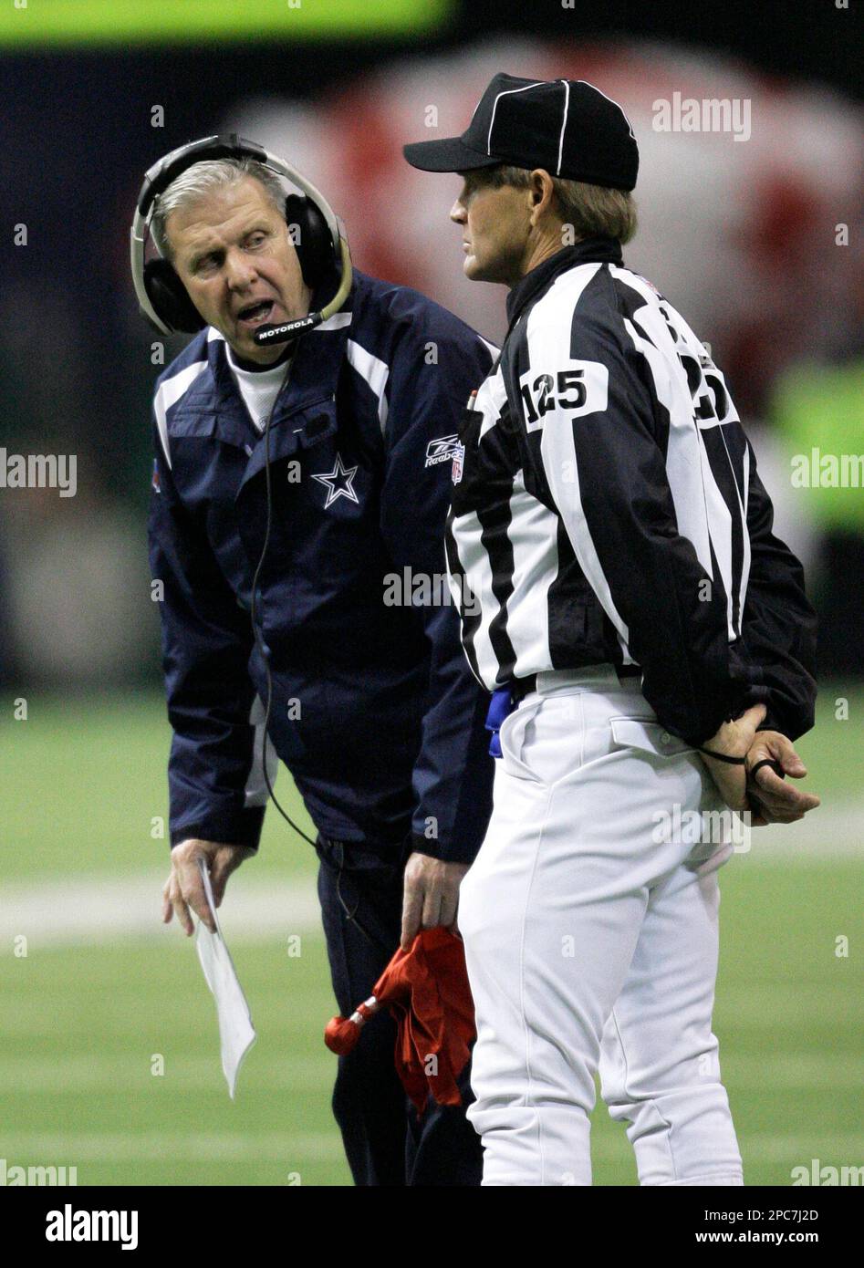 Dallas Cowboys coach Bill Parcells has a word with side judge Laird ...