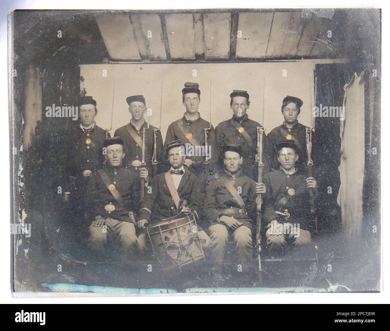 Nine unidentified soldiers in Union uniforms and forage caps, eight ...