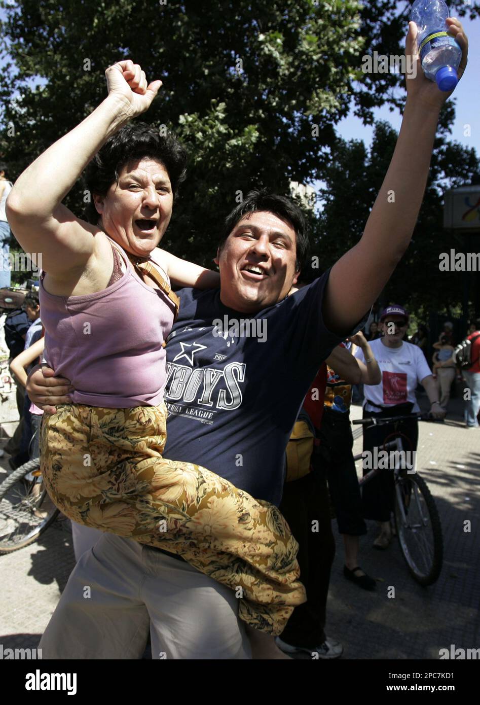 Opponents of Chile's former dictator Augusto Pinochet celebrate his ...
