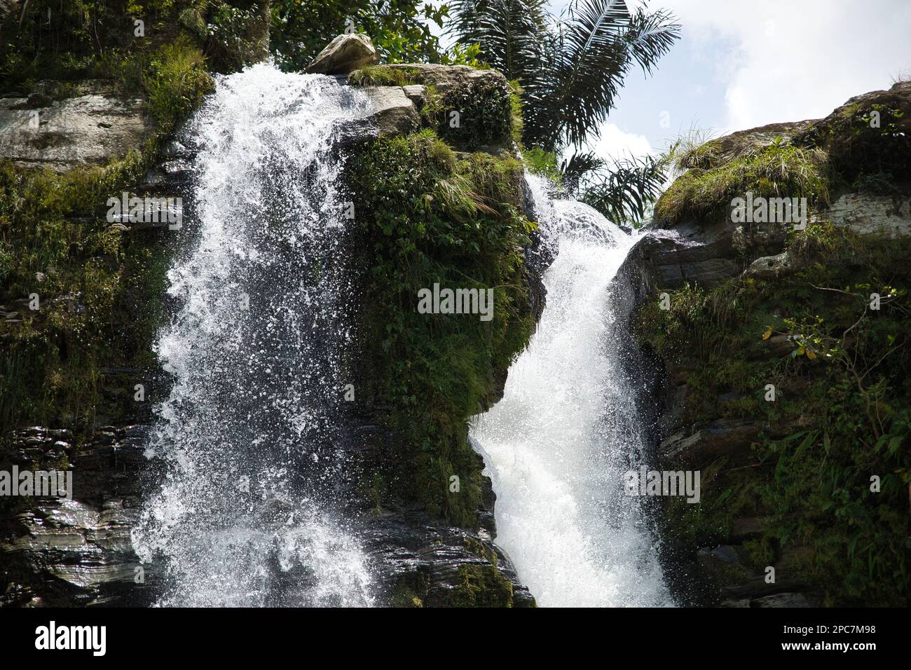 The spectacular Air Terjun Tengkulese waterfall on Flores, surrounded ...