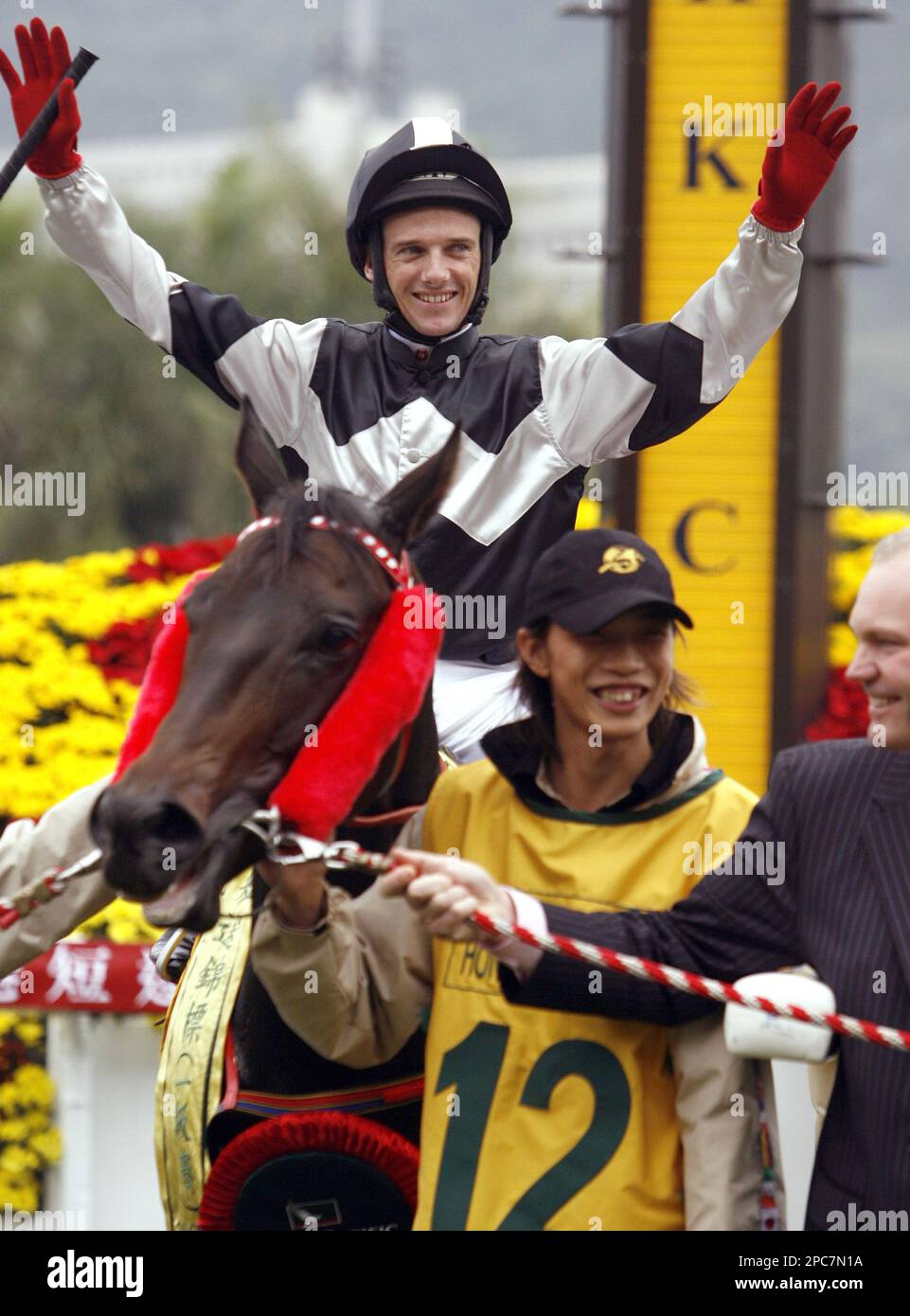 Jockey Brett Prebble riding Hong Kong horse Absolute Champion ... Jockey Brett Prebble riding Hong Kong horse Absolute Champion ...
