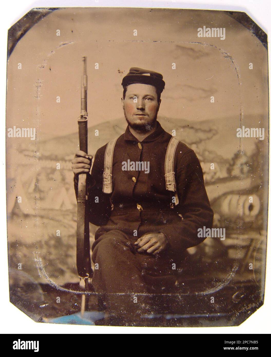 Unidentified soldier in Union uniform with carbine in front of painted ...