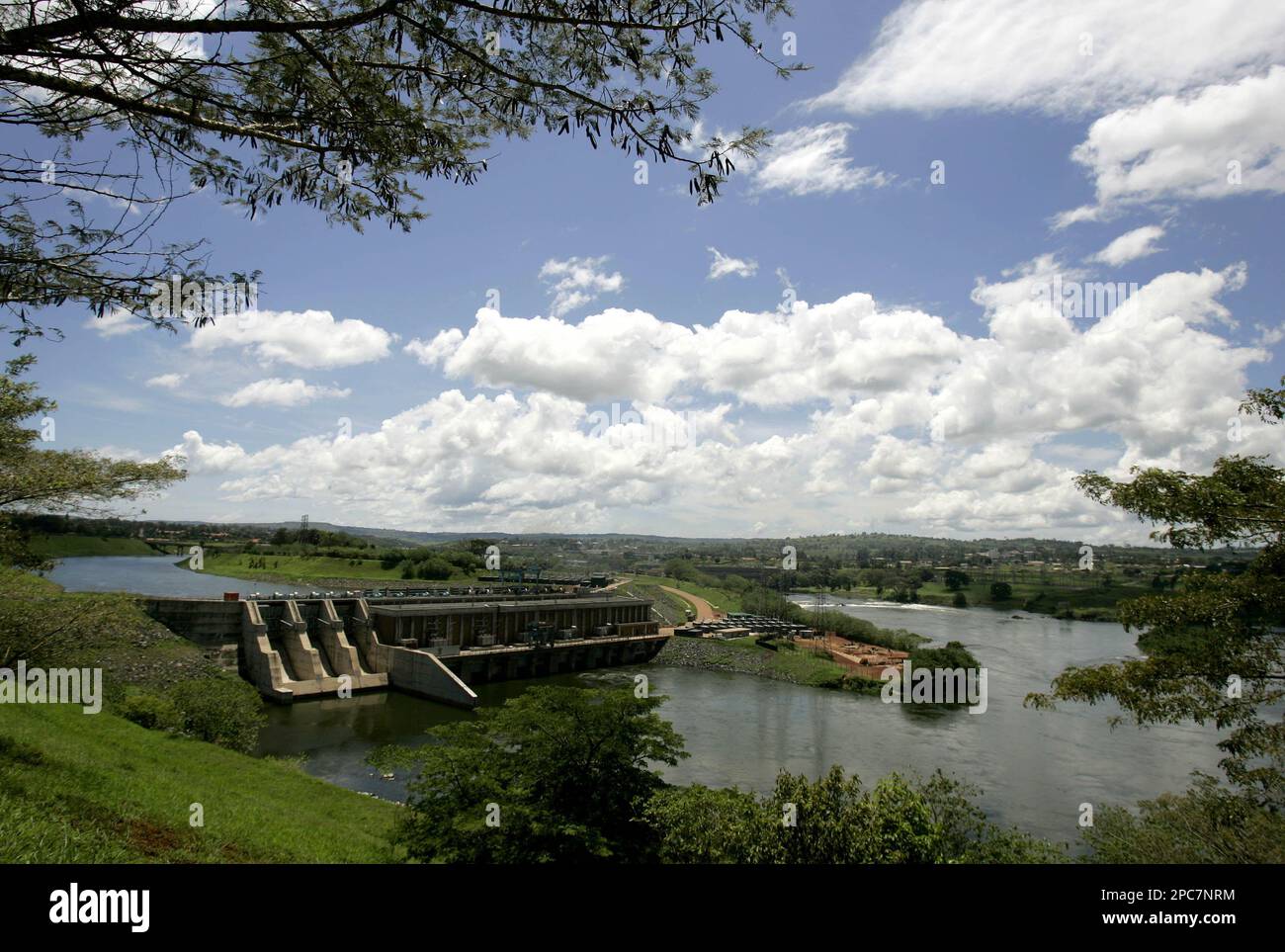 ** ADVANCE FOR SUNDAY, DEC. 10 ** The new Kiira Dam, left, runs in ...