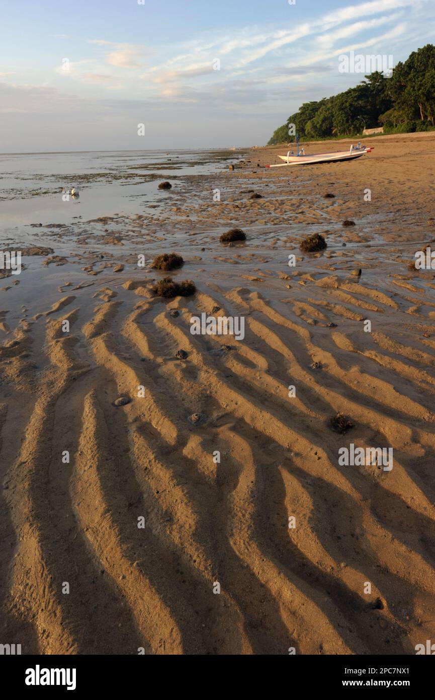View of sandy beach with boat, Sanur Beach, Denpasar, Bali, Lesser ...