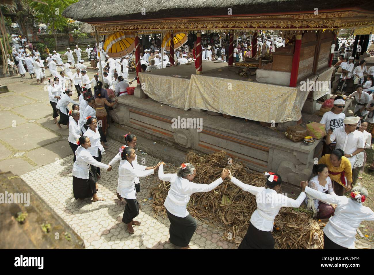 Sutri (old 'chosen' woman) hold hands in a procession at the Siat ...