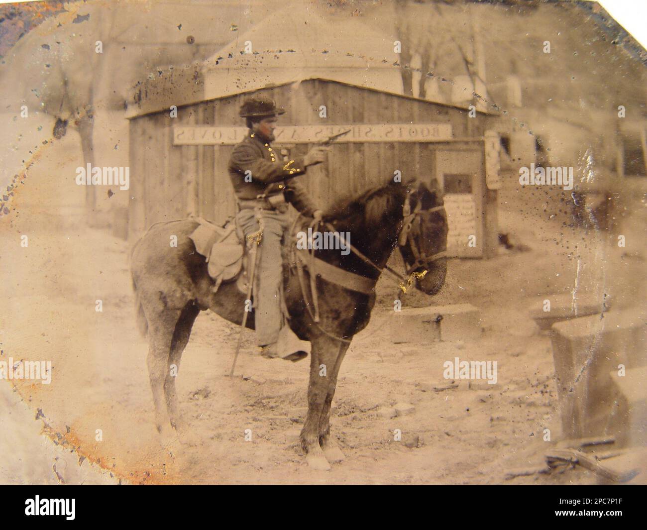 Unidentified cavalry soldier in Union uniform with saber, revolver, and ...