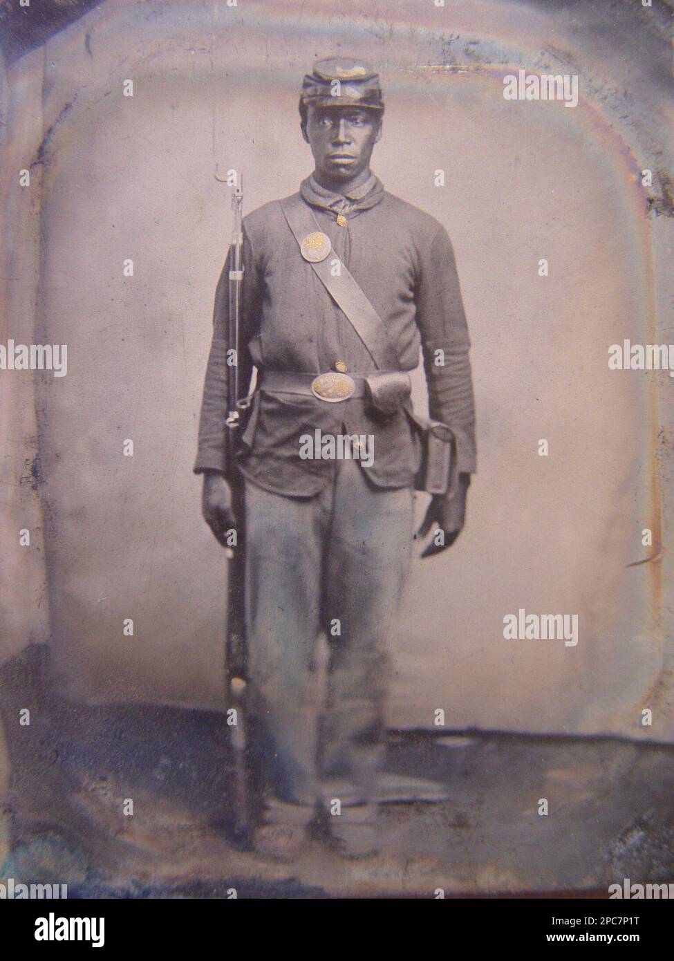 Unidentified African American soldier in Union uniform with bayoneted ...