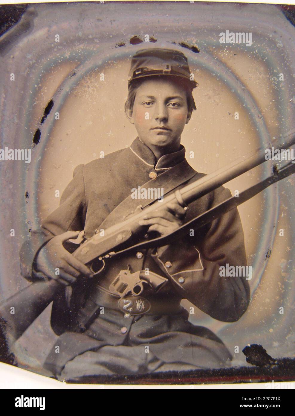 Unidentified young soldier in Union uniform holding musket with ...