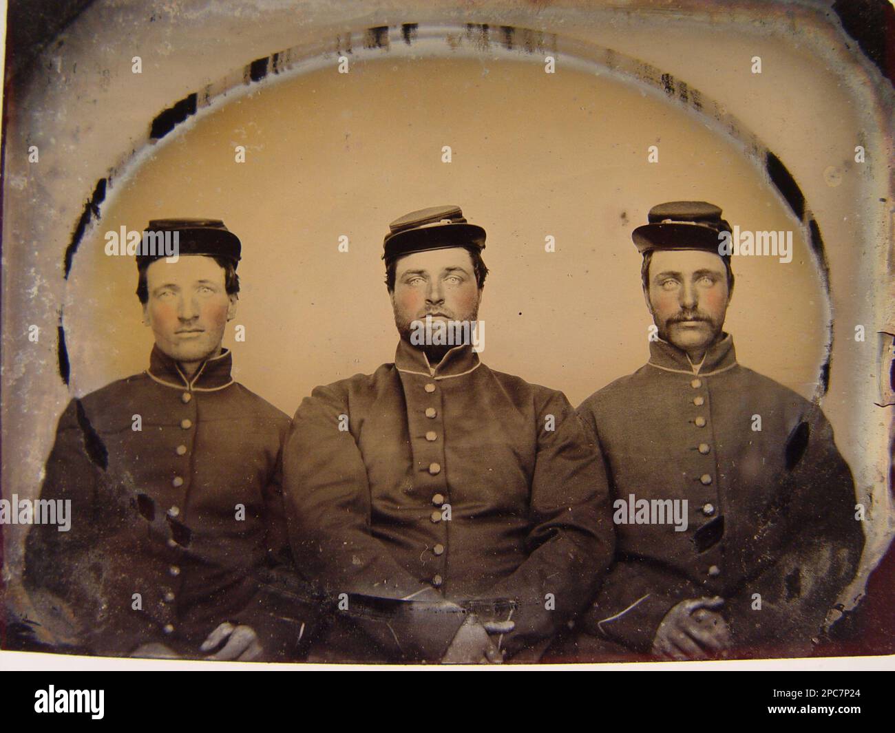 Three unidentified soldiers in Union uniforms and forage caps. Liljenquist Family Collection of ...