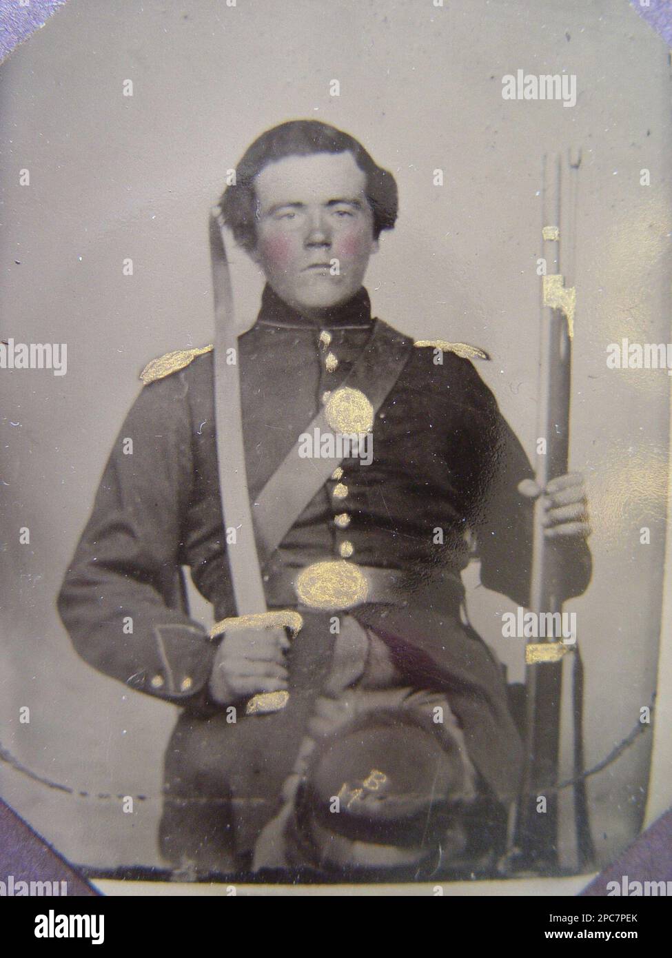 Unidentified soldier in Union uniform and shoulder scales with musket ...