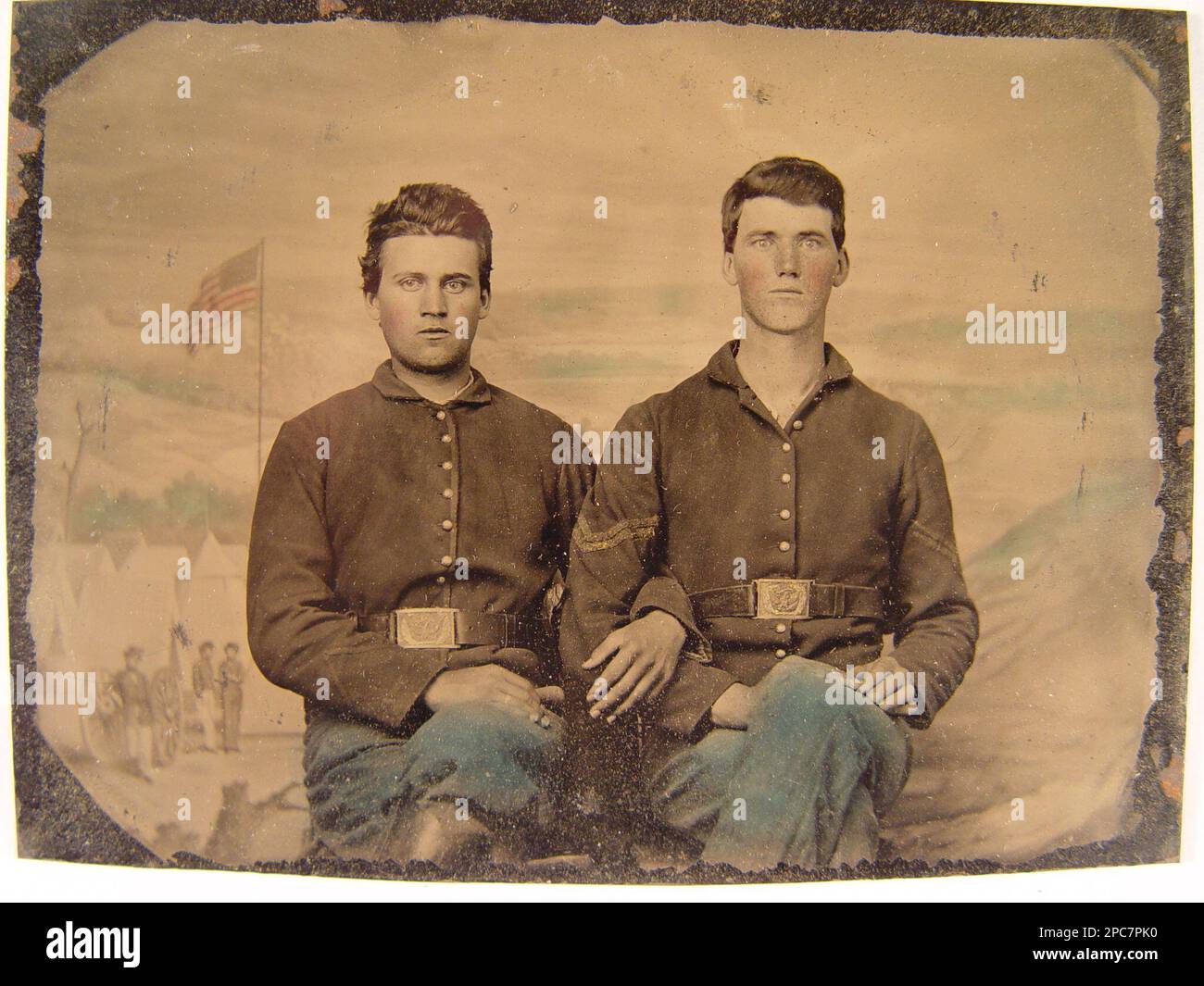 Two unidentified soldiers in Union uniforms in front of painted ...