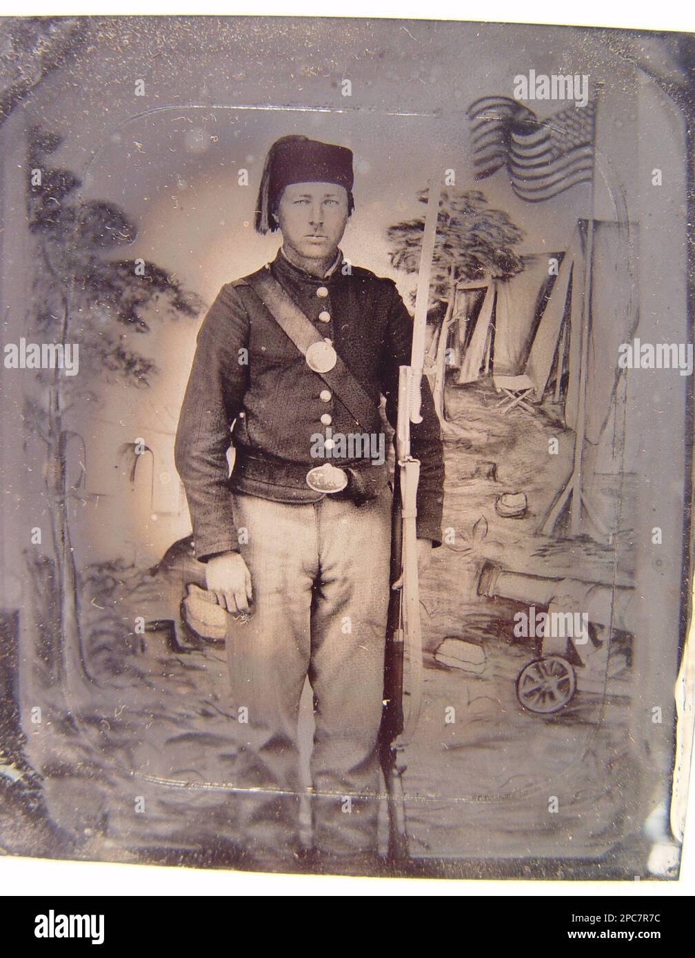 Unidentified soldier in Union uniform, Zouave fez, and New York buckle ...