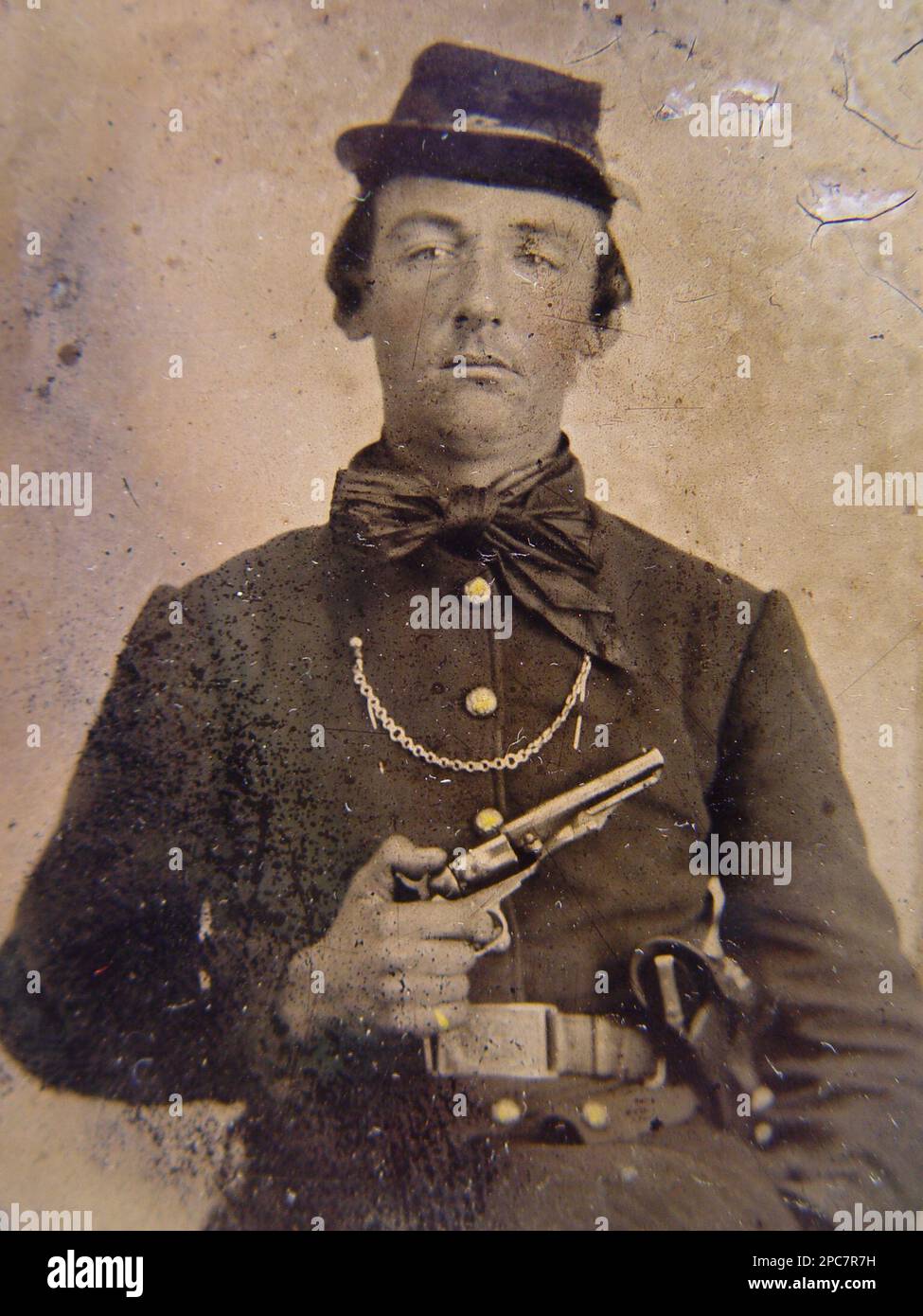 Unidentified soldier in Union uniform and forage cap with revolver ...