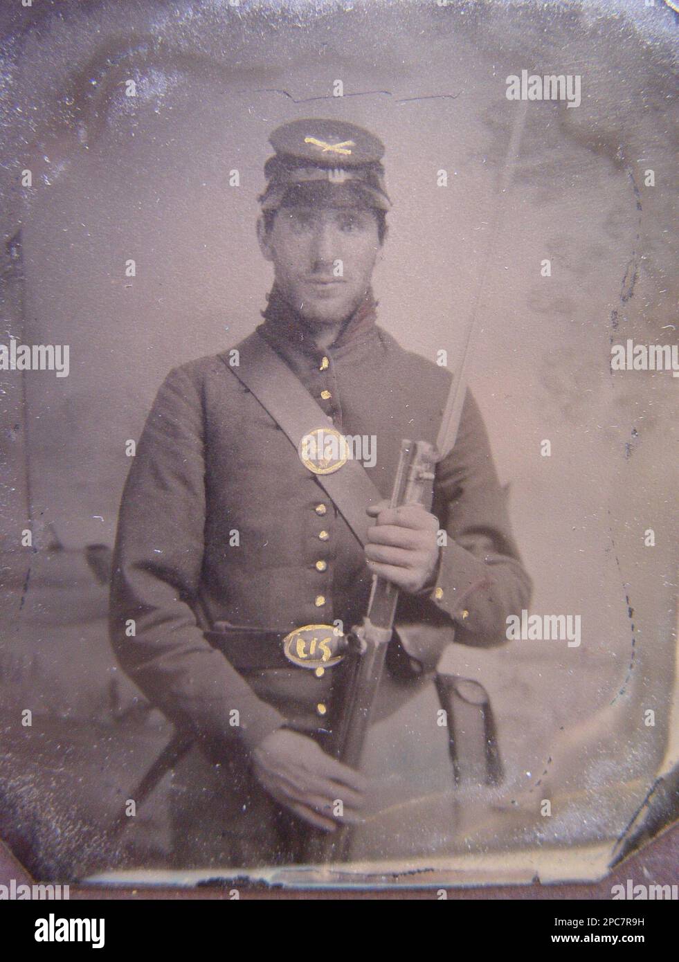Captain Joseph W. Winger of Company D, 2nd Pennsylvania Heavy Artillery Regiment in uniform with ...