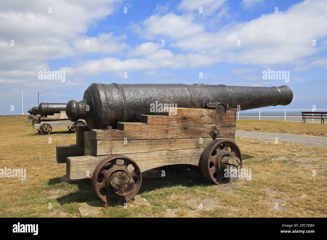 18th Century 18-pounder guns on seafront of seaside town, Gun Hill ...