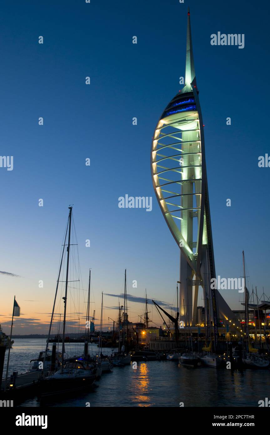 View of harbour and waterfront with Spinnaker Tower illuminated after ...