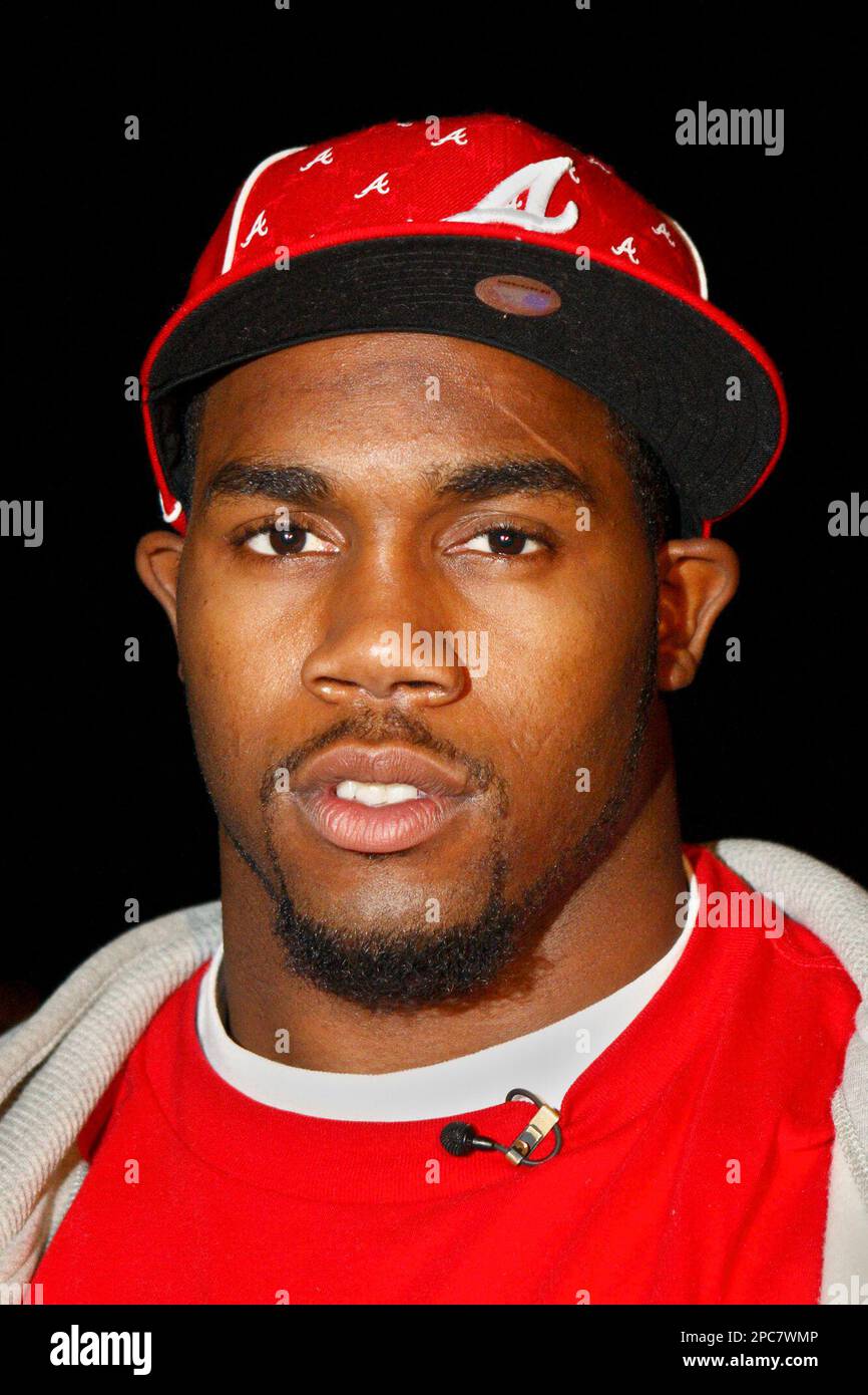 One of the three Heisman Trophy finalists, Arkansas running back Darren ...