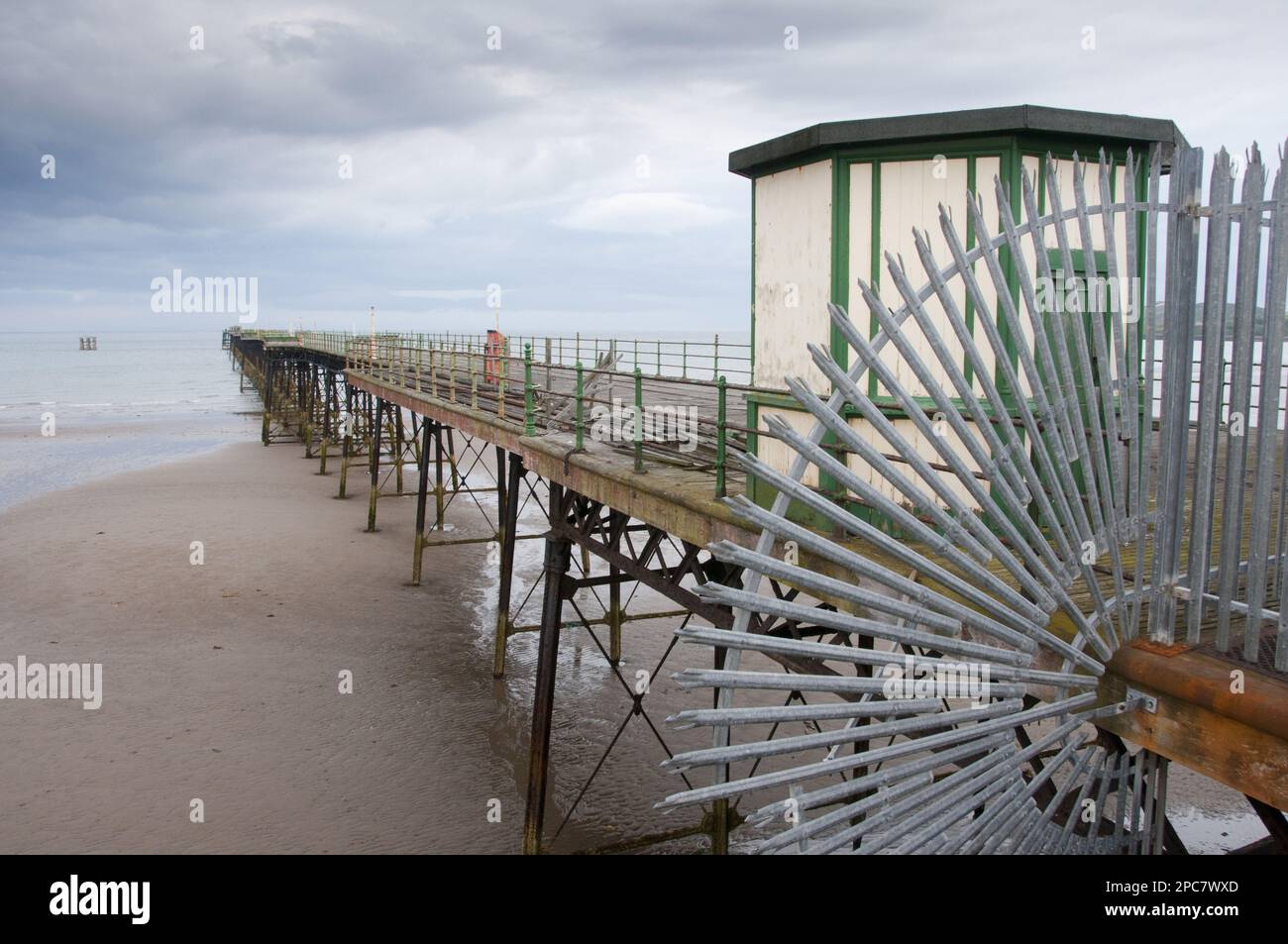 View of beach and enclosed iron pier, Queen's Pier, Ramsey, Isle of Man ...