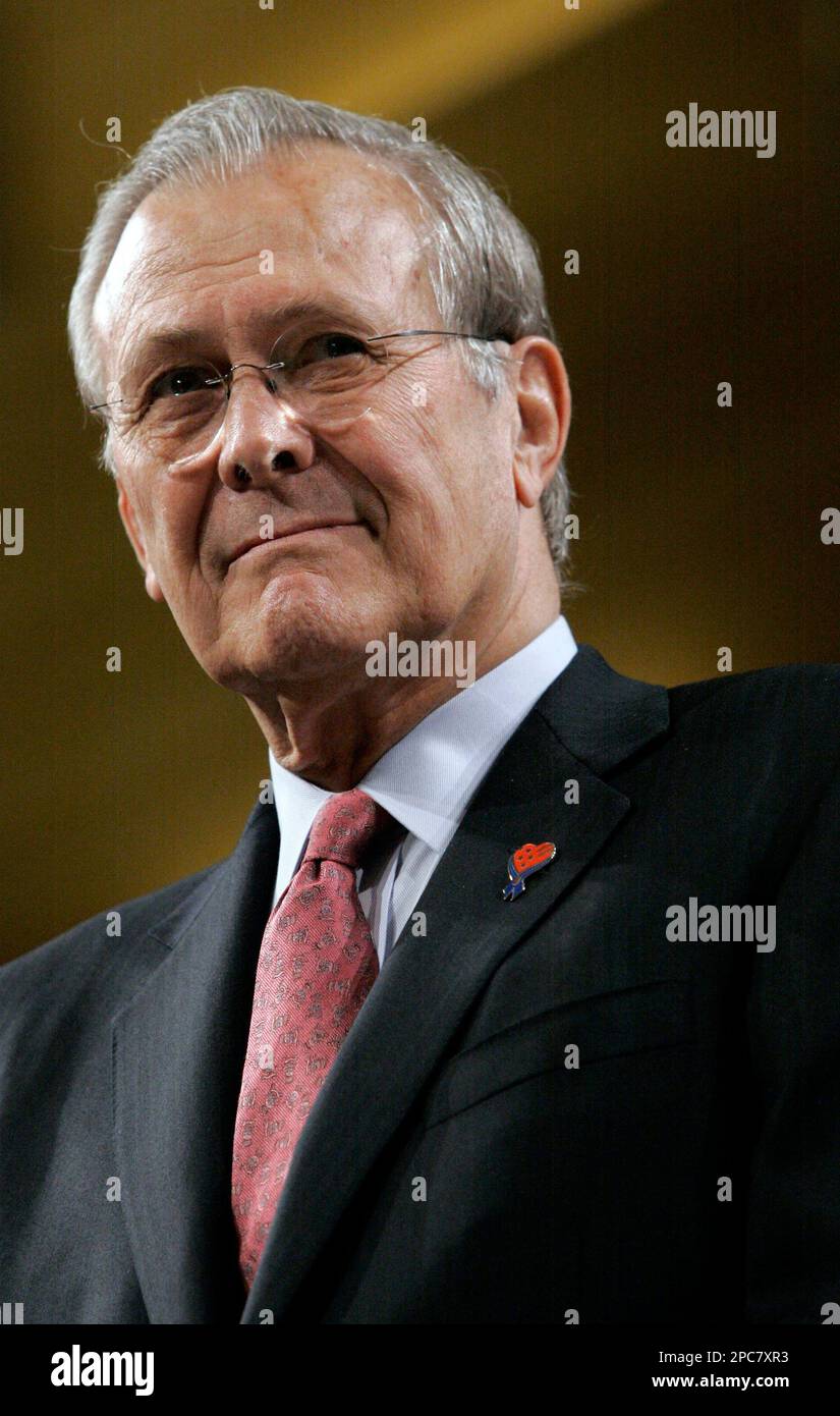 Outgoing Defense Secretary Donald H. Rumsfeld pauses during his speech ...