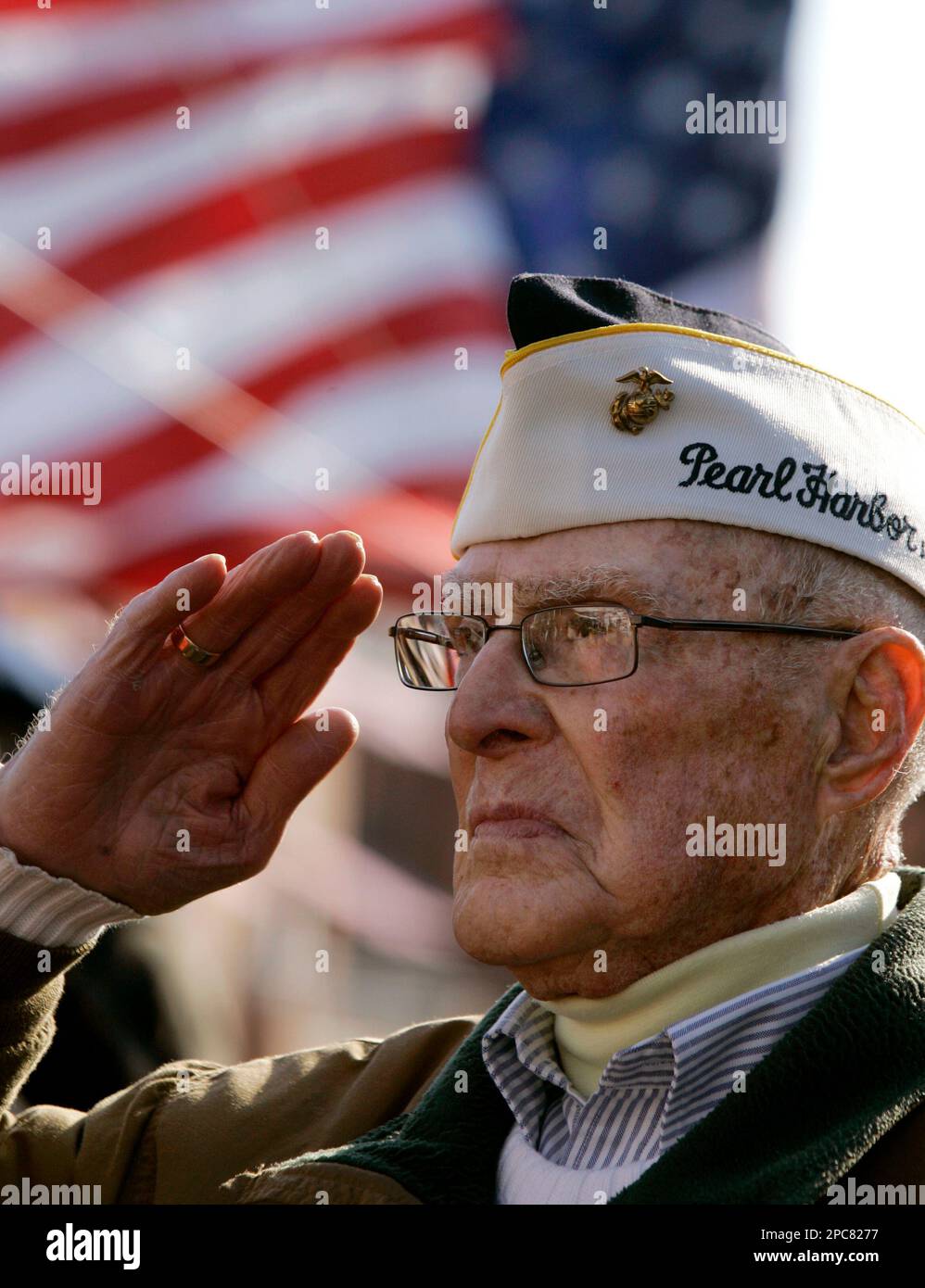 Pearl Harbor survivor Thomas C. Talbott, 85, of Baltimore, salutes ...
