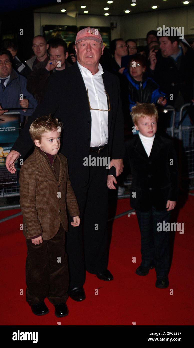 British director Tony Scott arrives with his twin sons Frank and Max ...
