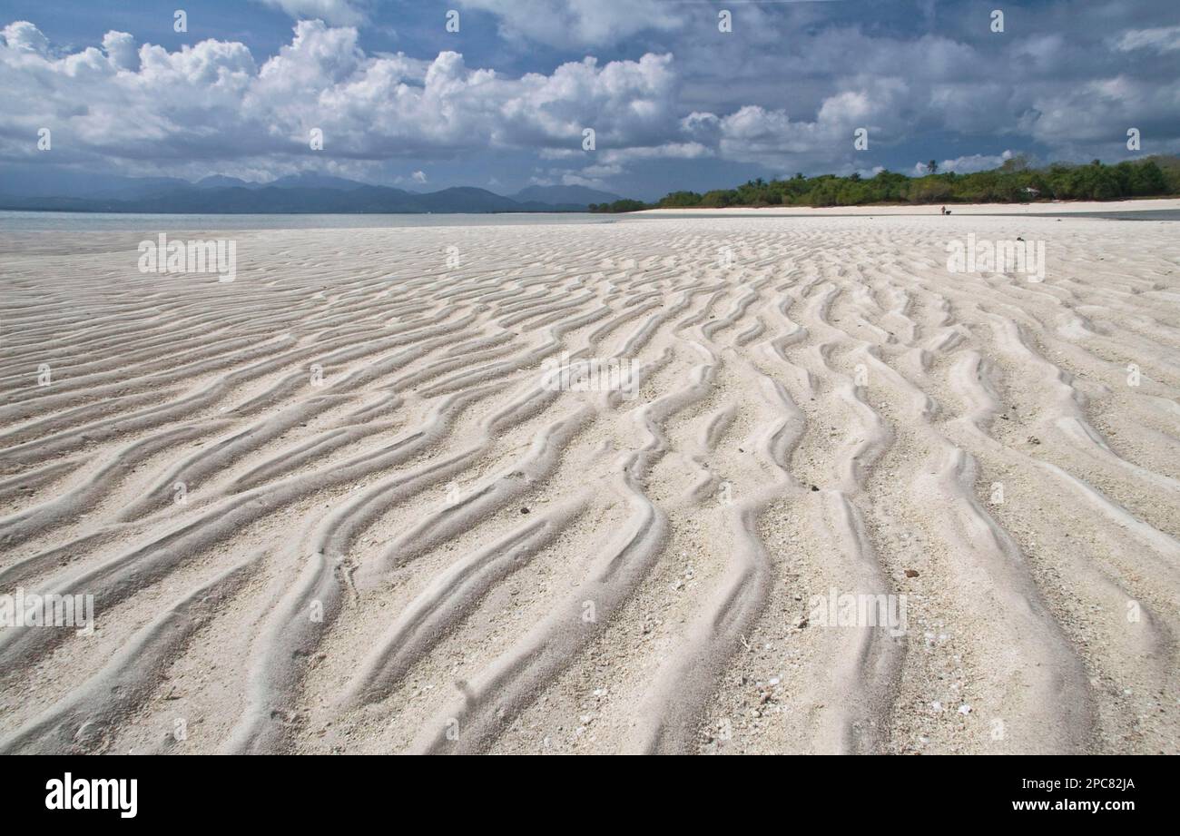 Waves in the sand, inter-tidal sand on the coast, Palawan Island ...